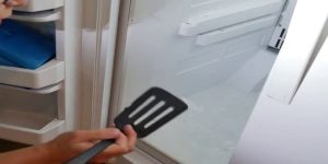 Ice Build Up in Bottom of Freezer [5 Quick Fixes] Fix Ice Blockage